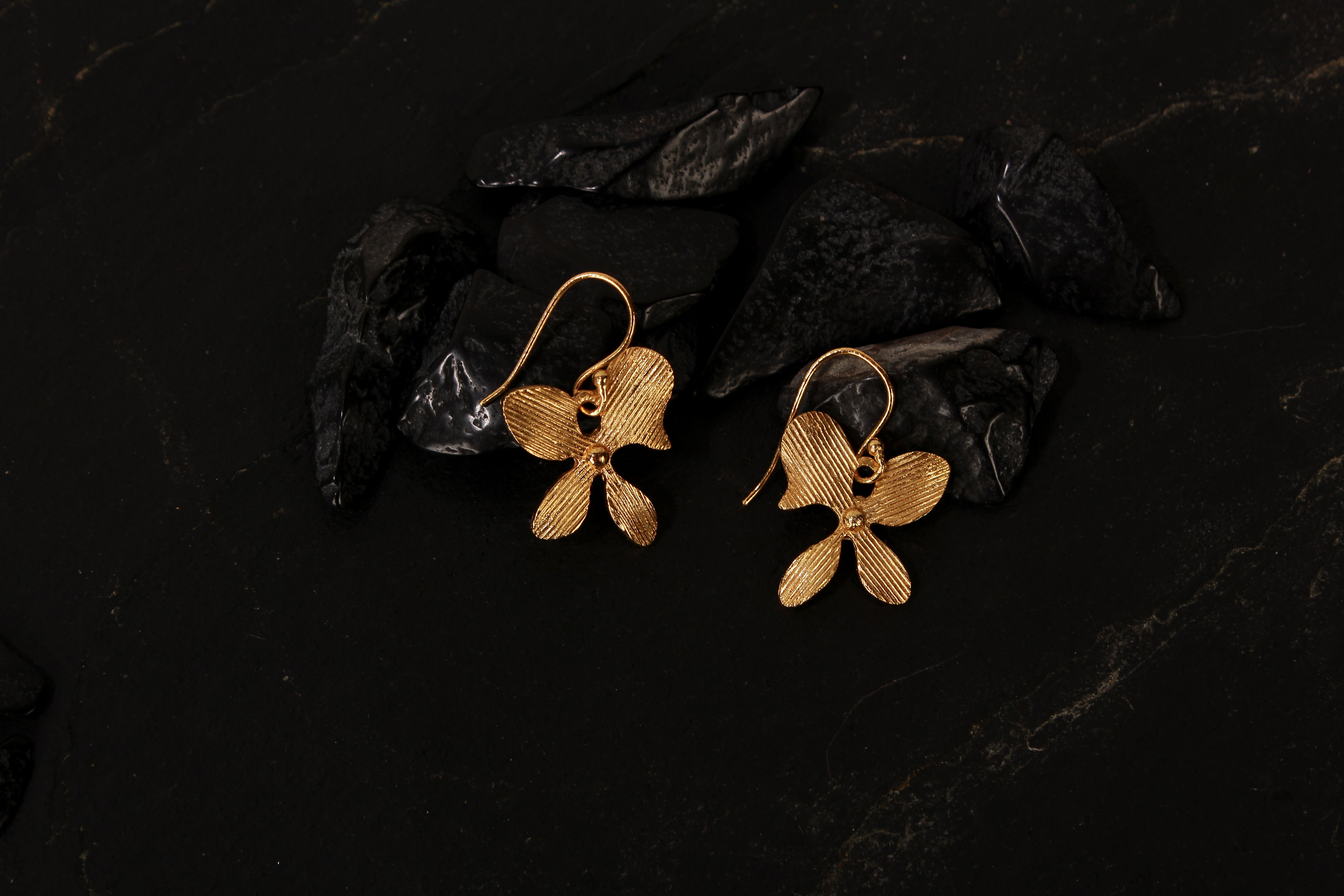 jewelry - berserk - gold plated asymmetric floral loops - maati crafts